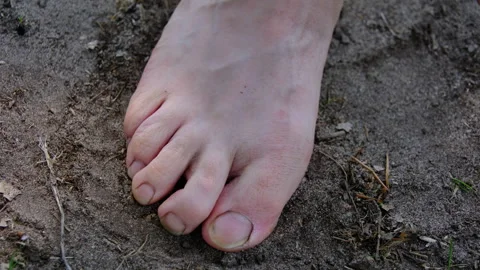 Close up of barefoot toes with slightly ... | Stock Video | Pond5