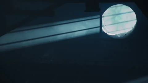 Close-up of a beam of light passing thro... | Stock Video | Pond5