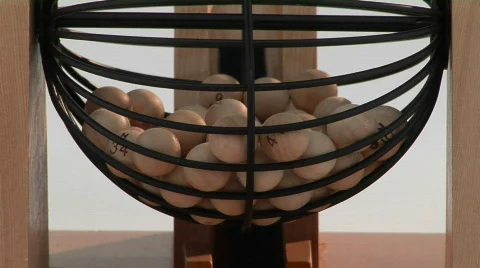 Close-up of bingo balls spinning in a bi... | Stock Video | Pond5