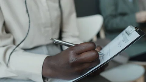 Close Up Of Black Woman Filling Work She... | Stock Video | Pond5