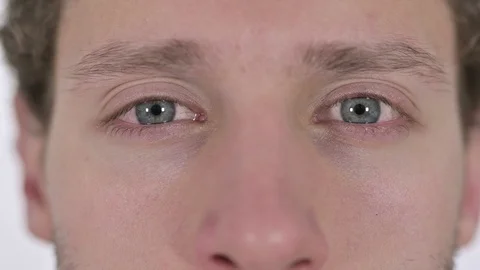 Close up of Blinking Eyes of Young Man o... | Stock Video | Pond5