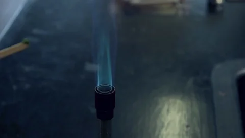 Close up of blue bunsen burner flame fol... | Stock Video | Pond5