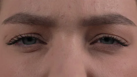 Close up of a blue-eyed woman squint her... | Stock Video | Pond5