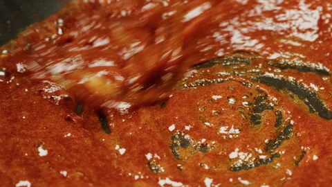 Close up of boiling sugar with bubbles t... | Stock Video | Pond5