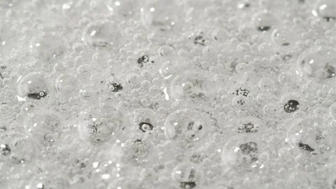 Close up of boiling sugar with bubbles t... | Stock Video | Pond5