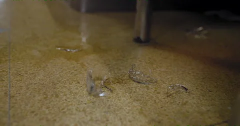 Broken Glass Falling Stock Videos – Royalty-Free HD & 4K Videos