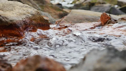 Close-up of a bubbling natural spring of... | Stock Video | Pond5