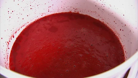 Close up of a bucket full of blood at bu... | Stock Video | Pond5