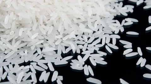 Close-up of a bunch of rice put on the b... | Stock Video | Pond5