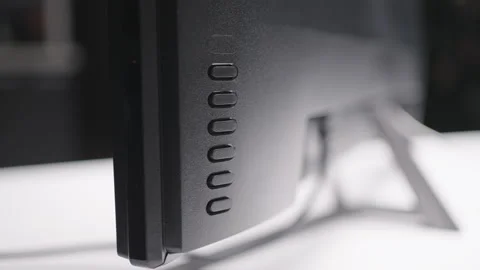 Close-up of buttons behind monitor. Acti... | Stock Video | Pond5