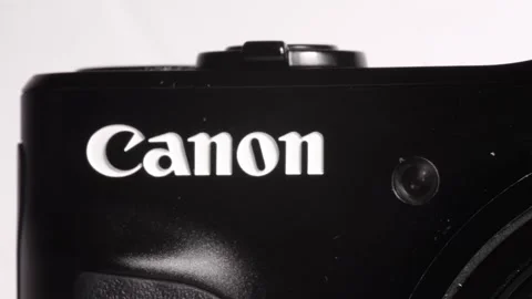 A close up to a Canon camera logo. | Stock Video | Pond5