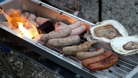 Close up with the charcoal is burn. Oyst... | Stock Video | Pond5