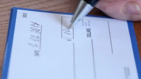 Signing A Check Stock Footage ~ Royalty Free Stock Videos | Pond5