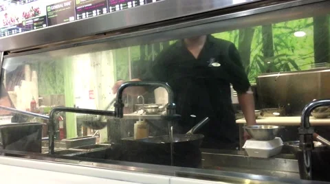 Close up chef cooking foods at food cour... | Stock Video | Pond5