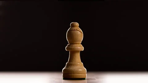 Close up of chess pieces against black b... | Stock Video | Pond5