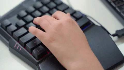 Close up child hand typing computer game... | Stock Video | Pond5