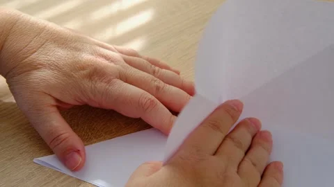 close-up of colored paper, female hands ... | Stock Video | Pond5