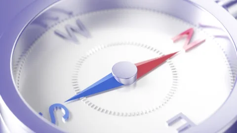 Close-up of a compass on a purple backgr... | Stock Video | Pond5