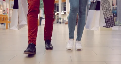 Close-up of a couple walking feet in a m... | Stock Video | Pond5