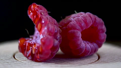 Close-up. Cross section of a raspberry. ... | Stock Video | Pond5