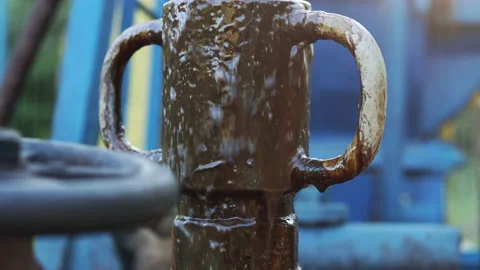 Close up of crude oil overflowing stuffi... | Stock Video | Pond5