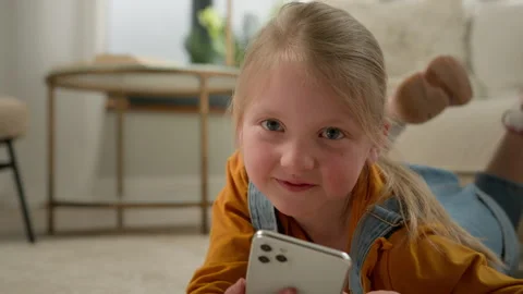 Close-up cute caucasian little kid girl ... | Stock Video | Pond5