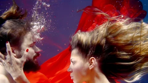 close up. cute couple deep underwater in... | Stock Video | Pond5