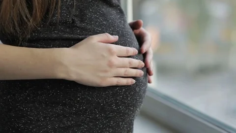 Close up of a cute pregnant belly | Stock Video | Pond5