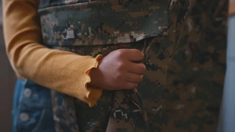 Close Up Of Daughter Hugging Legs Of Arm... | Stock Video | Pond5