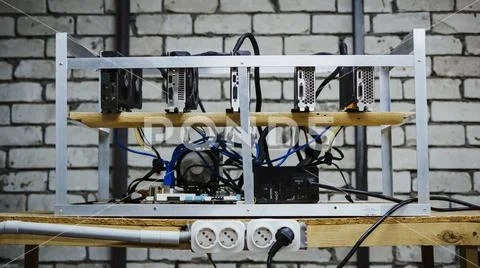 Close up details of modern mining rig with five gpu card, graphics cards used Stock Photo #192961145