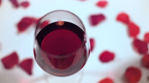 Close up of a drop falling in a glass wi... | Stock Video | Pond5