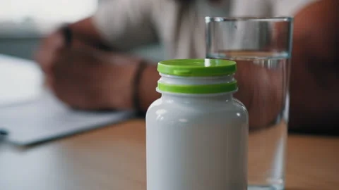 Close up drug pills bottle with painkill... | Stock Video | Pond5
