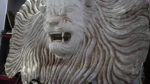 Close up face of a Lion in clay idol of ... | Stock Video | Pond5