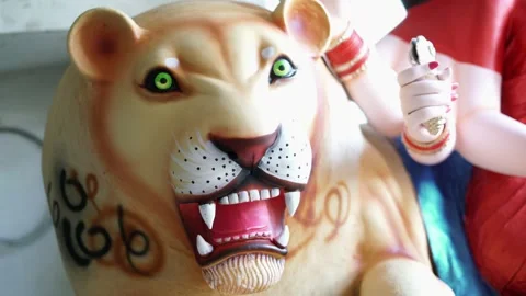 Close up face of a Lion in clay idol of ... | Stock Video | Pond5
