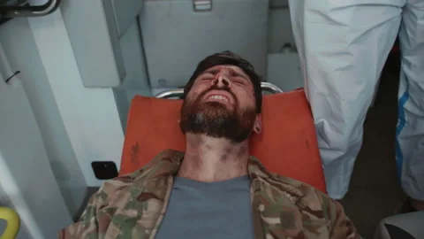 Close up face wounded military man lying... | Stock Video | Pond5