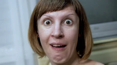 Close-up Facial Expressions of a Crazy W... | Stock Video | Pond5