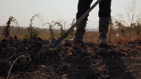 Close Up of Farmer Hard Work Digging wit... | Stock Video | Pond5