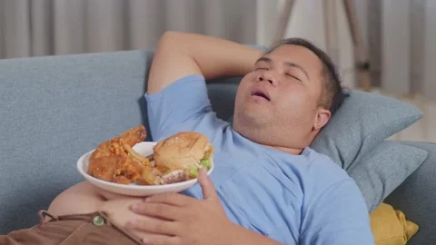 Close Up Of A Fat Asian Man Sleeping Whi... | Stock Video | Pond5