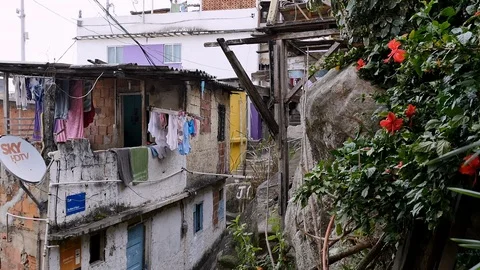 Close up of favela house in slum, lush p... | Stock Video | Pond5