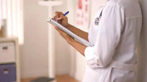 Close up of Female Doctor's hands writin... | Stock Video | Pond5