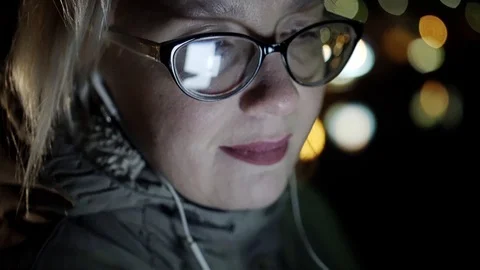 Close-up of a female face at night in th... | Stock Video | Pond5