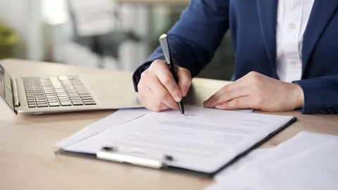 Close up of a female hand signing docume... | Stock Video | Pond5