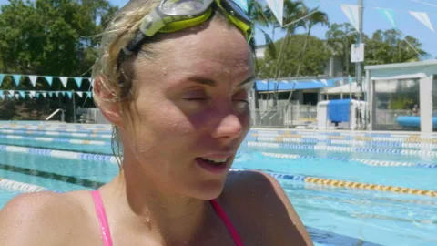 Close Up Of Female Swimmer Athlete Putti... | Stock Video | Pond5