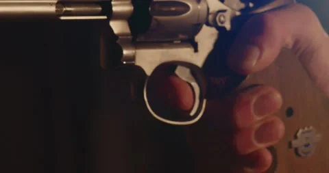 Close up of Finger pulling trigger of re... | Stock Video | Pond5