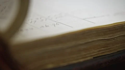 Close up of flipped pages of an old book... | Stock Video | Pond5