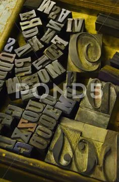 Close up of fonts from antique printing press ~ Hi Res #27803413