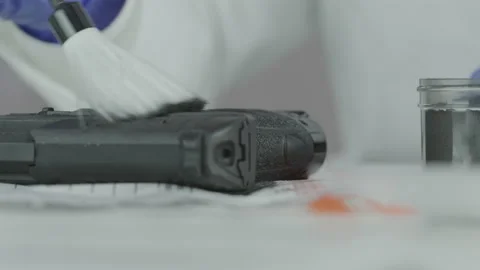 Close Up of Forensic Scientist Brushing ... | Stock Video | Pond5
