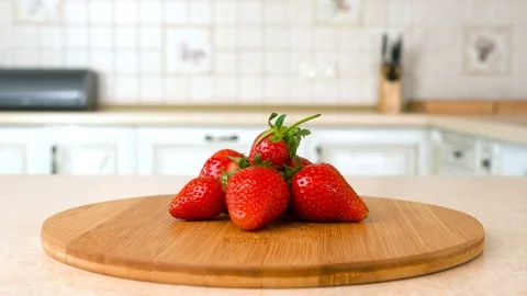 Close up of fresh whole strawberry. Rota... | Stock Video | Pond5