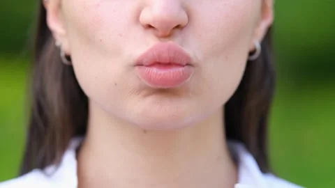 Close-up of a girl's lips. Young Girl sh... | Stock Video | Pond5