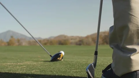 Close up of golf ball being hit with dri... | Stock Video | Pond5